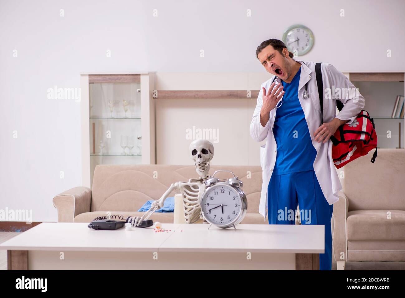 Male paramedic visiting skeleton patient Stock Photo - Alamy