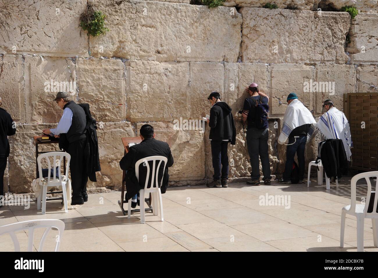 Men praying at the Western (Wailing) Wall in the old city of Jerusalem ...