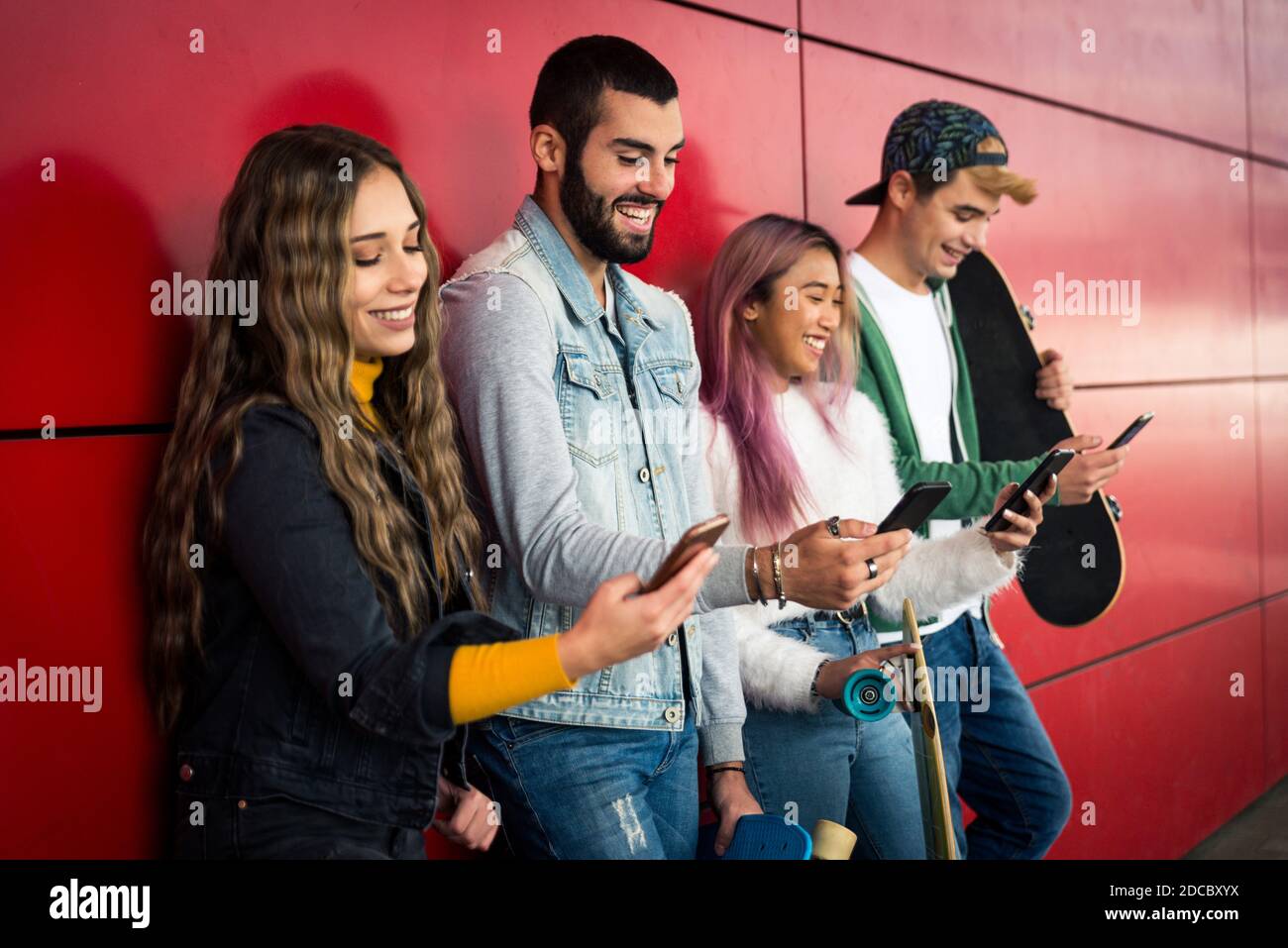 Happy young people meeting outdoors - Group of cheerful teenagers ...