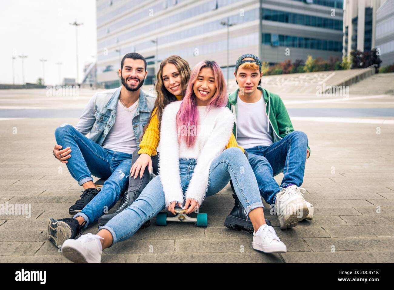 Happy young people meeting outdoors - Group of cheerful teenagers ...