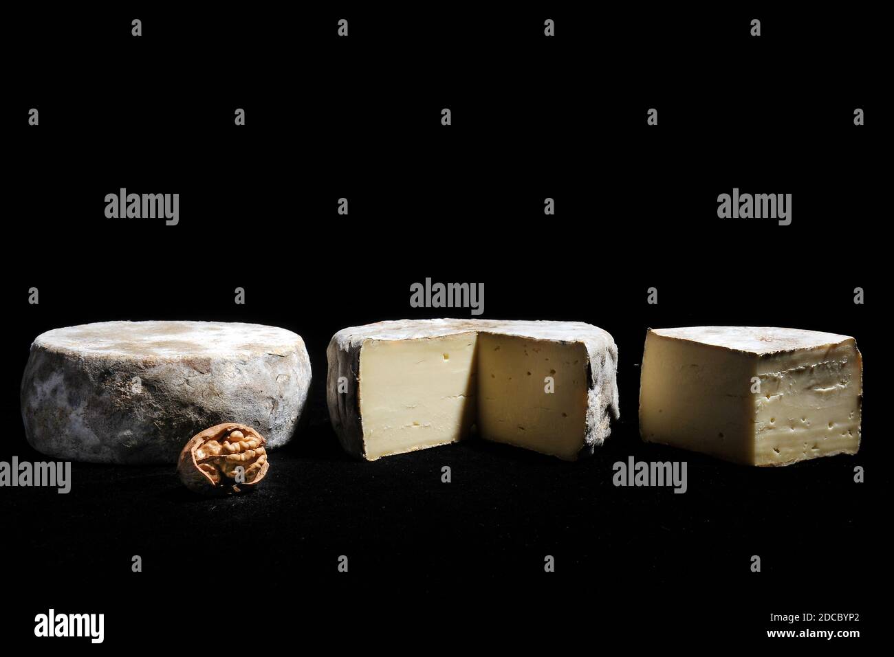 italian cheese called Toma from Piemonte region whit cutting light on ...