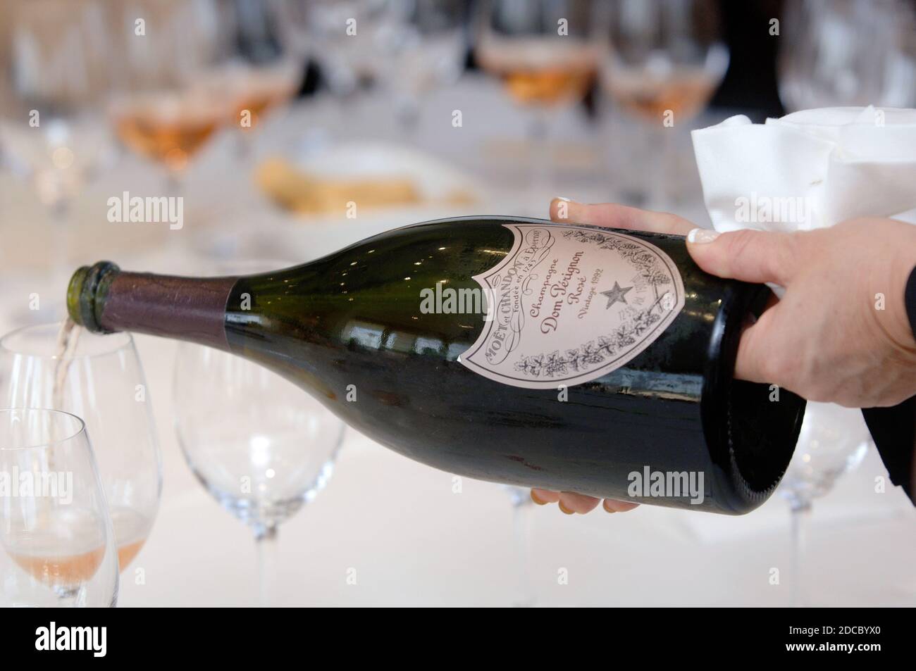 Tasting Dom Perignon champagne vintage Rose Stock Photo - Alamy