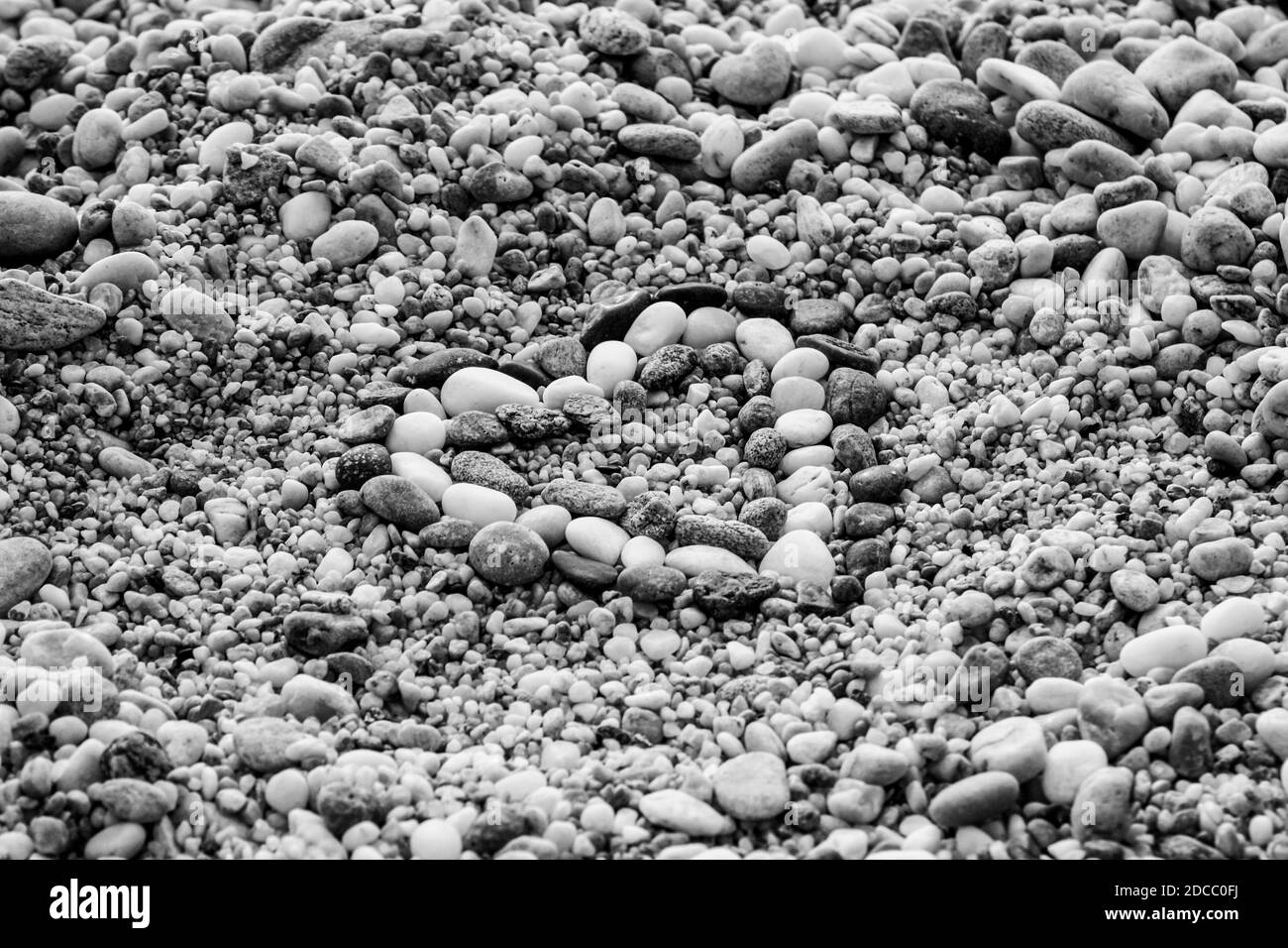 Pebbles stones in sea Black and White Stock Photos & Images - Alamy