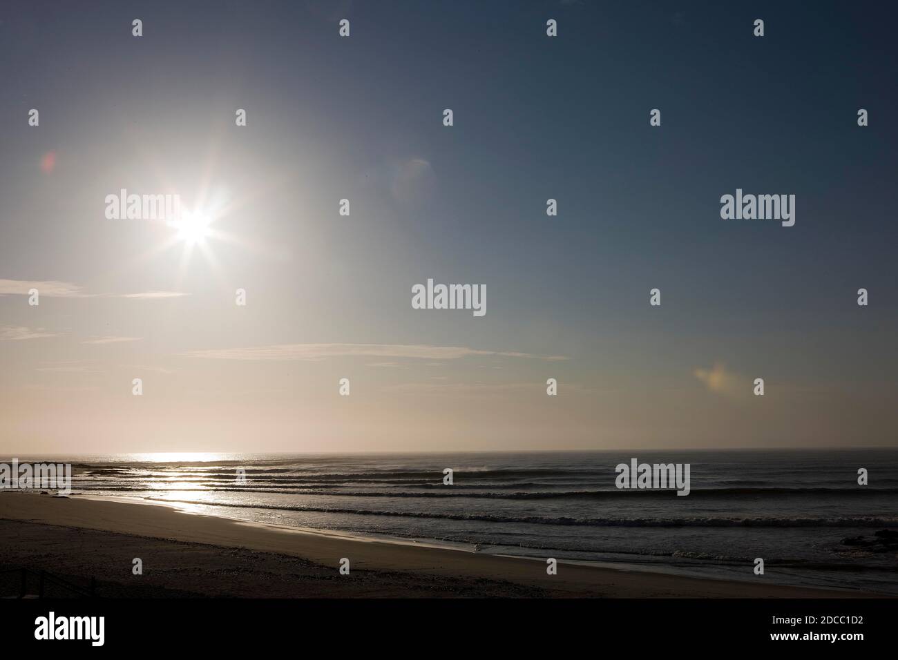 ATLANTIC OCEAN WITH BEACH AT SUNSET, CAPE CROSS IN NAMIBIA Stock Photo ...