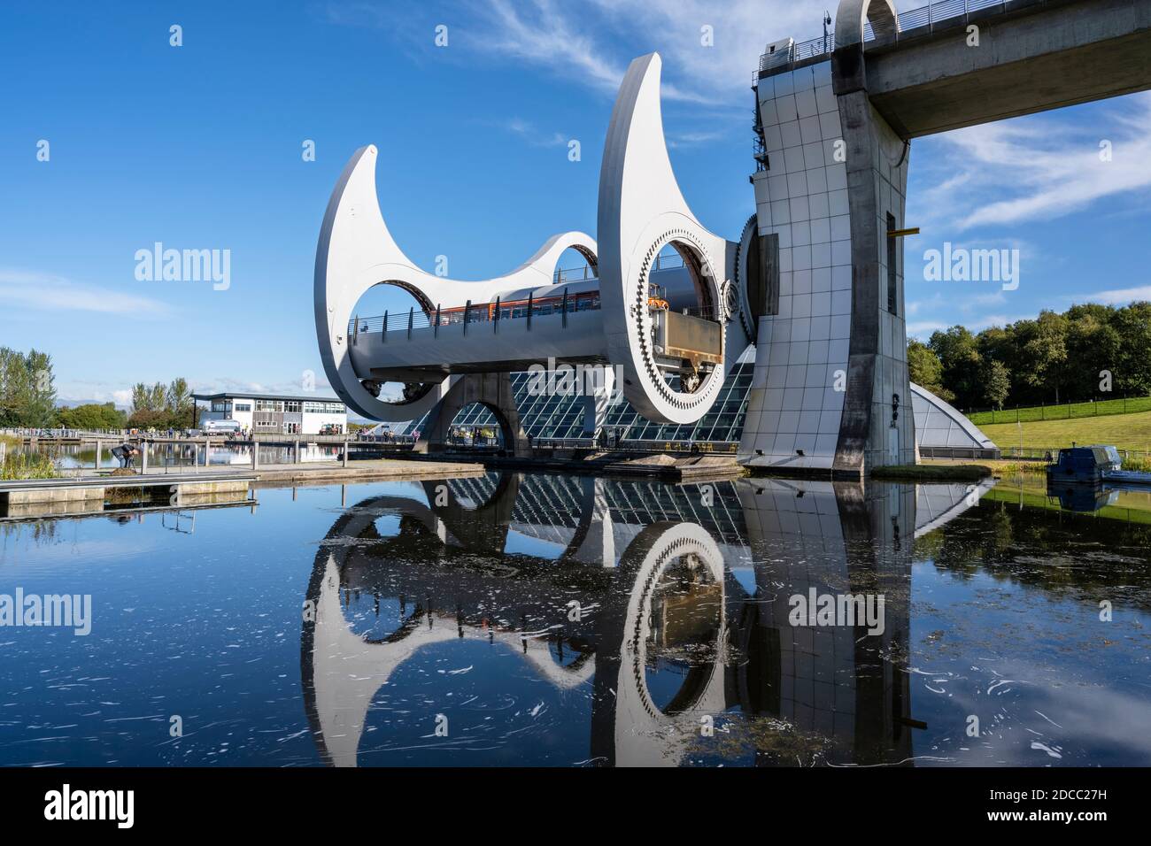 Canal boat descending from the top of the Falkirk Wheel rotating boat ...
