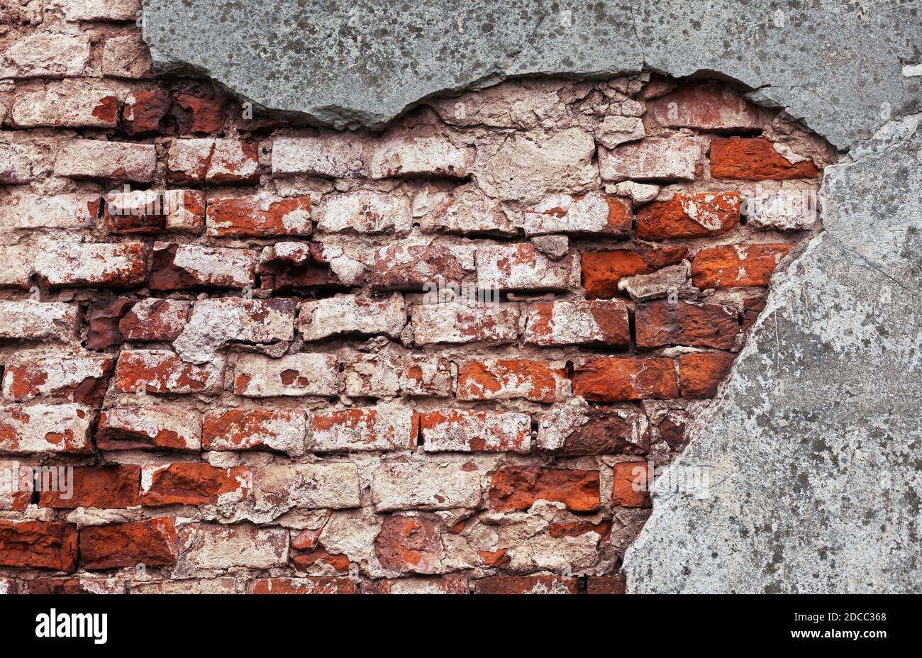 Old weathered brick wall. Aged brick wall with cracked plaster ...