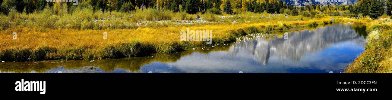 Banner image of the Snake River running through the Grand Tetons Stock ...