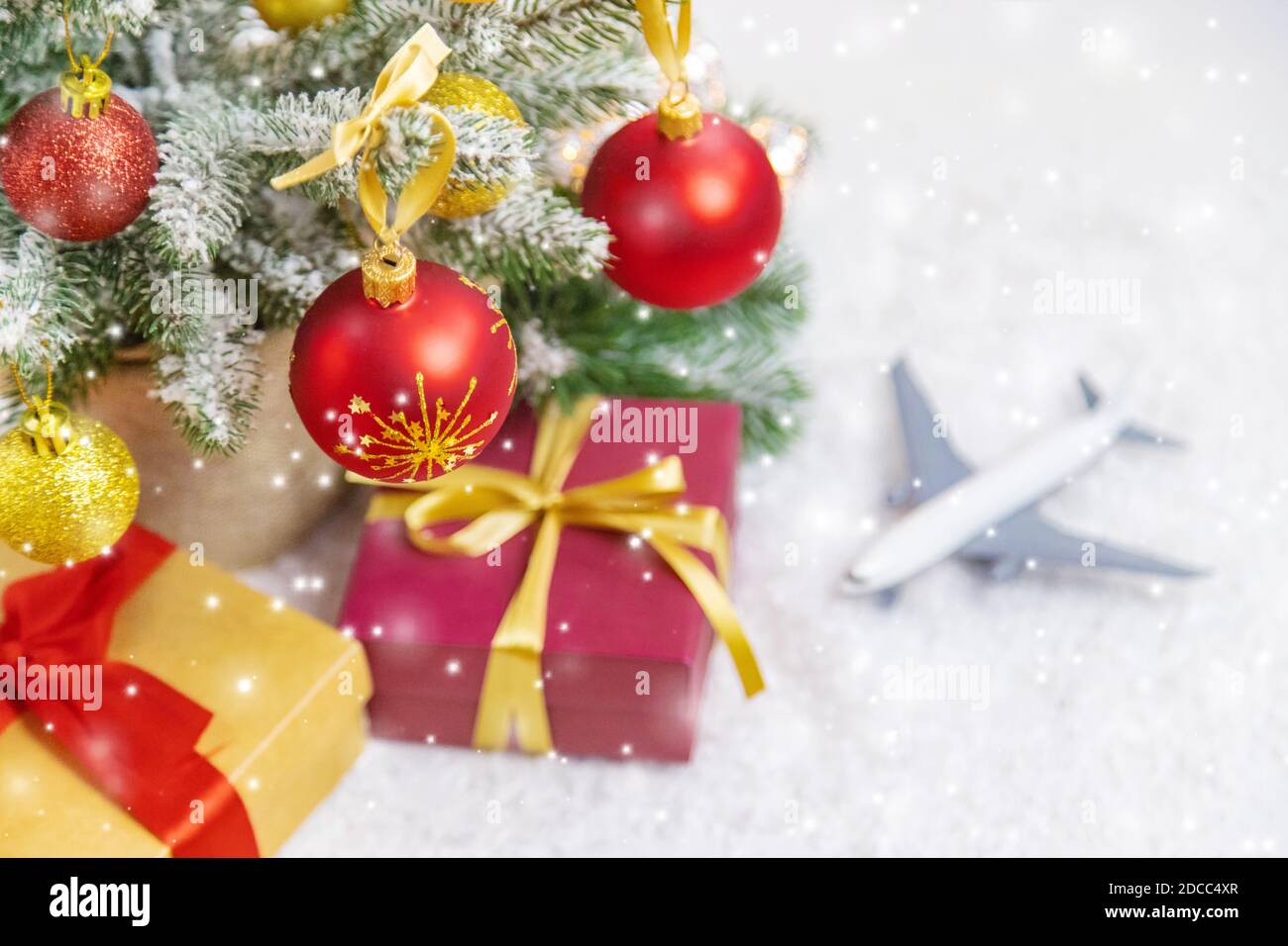 Travel for Christmas. Airplane with Christmas decor. Selective focus ...
