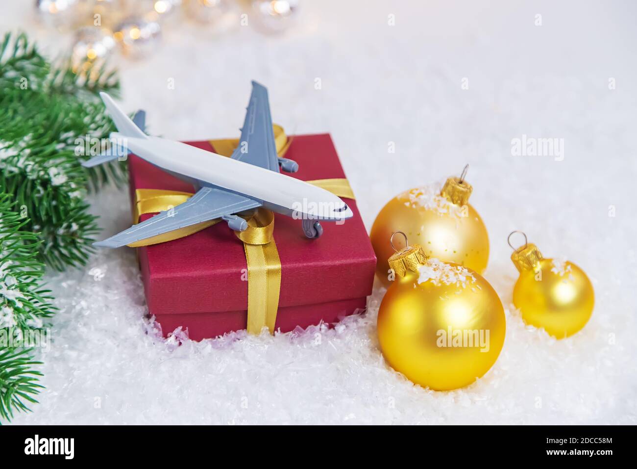 Travel for Christmas. Airplane with Christmas decor. Selective focus ...