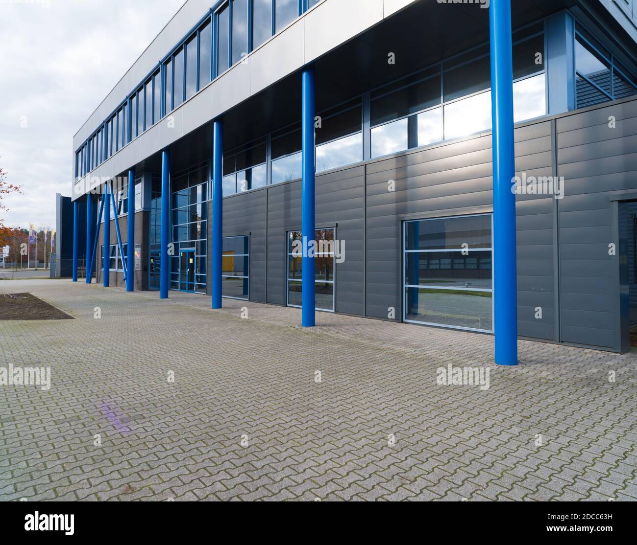 exterior of a modern office building with pillars Stock Photo - Alamy
