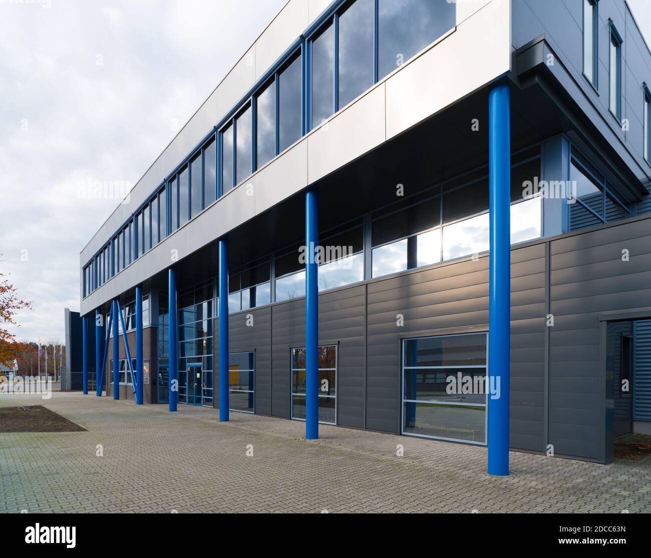 exterior of a modern office building with pillars Stock Photo - Alamy