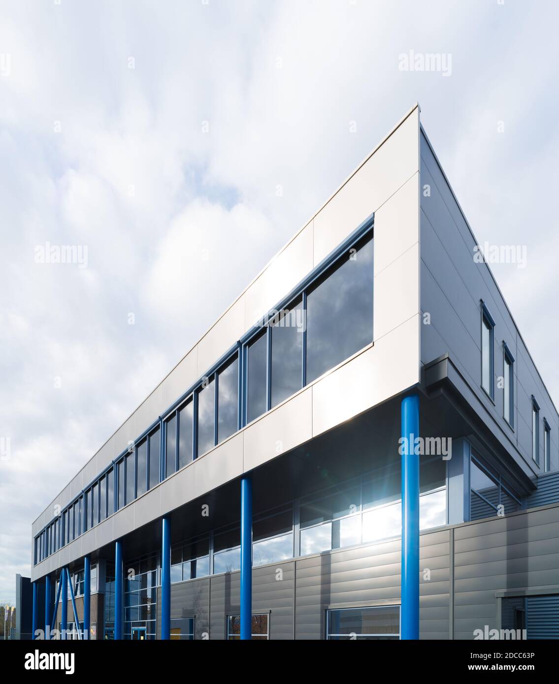 exterior of a modern office building with pillars Stock Photo - Alamy