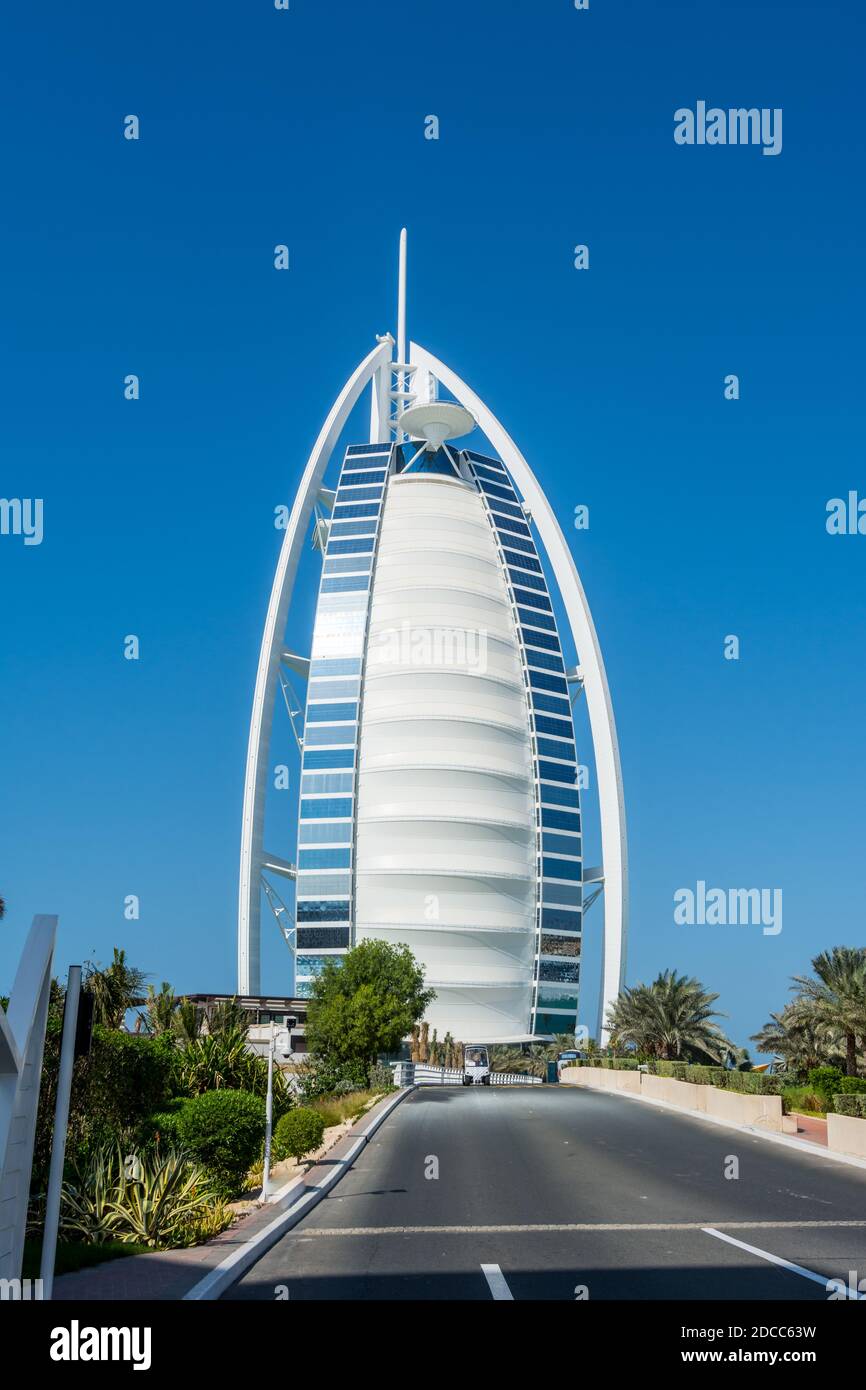 Front view of the hotel of Burj Al Arab Jumeirah against blue sky, the ...