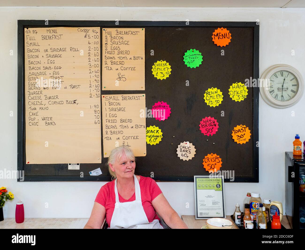 Babs sat under the menu board in BABS cafe. Blyth, Nottinghamshire ...