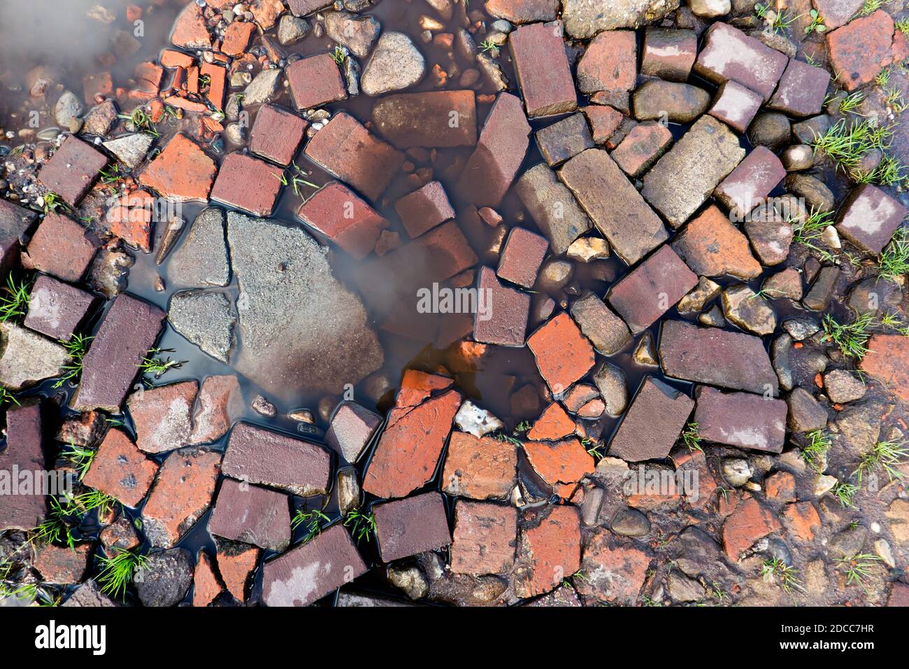 Very bad road conditions, a road surface consisting of rubble and mud ...