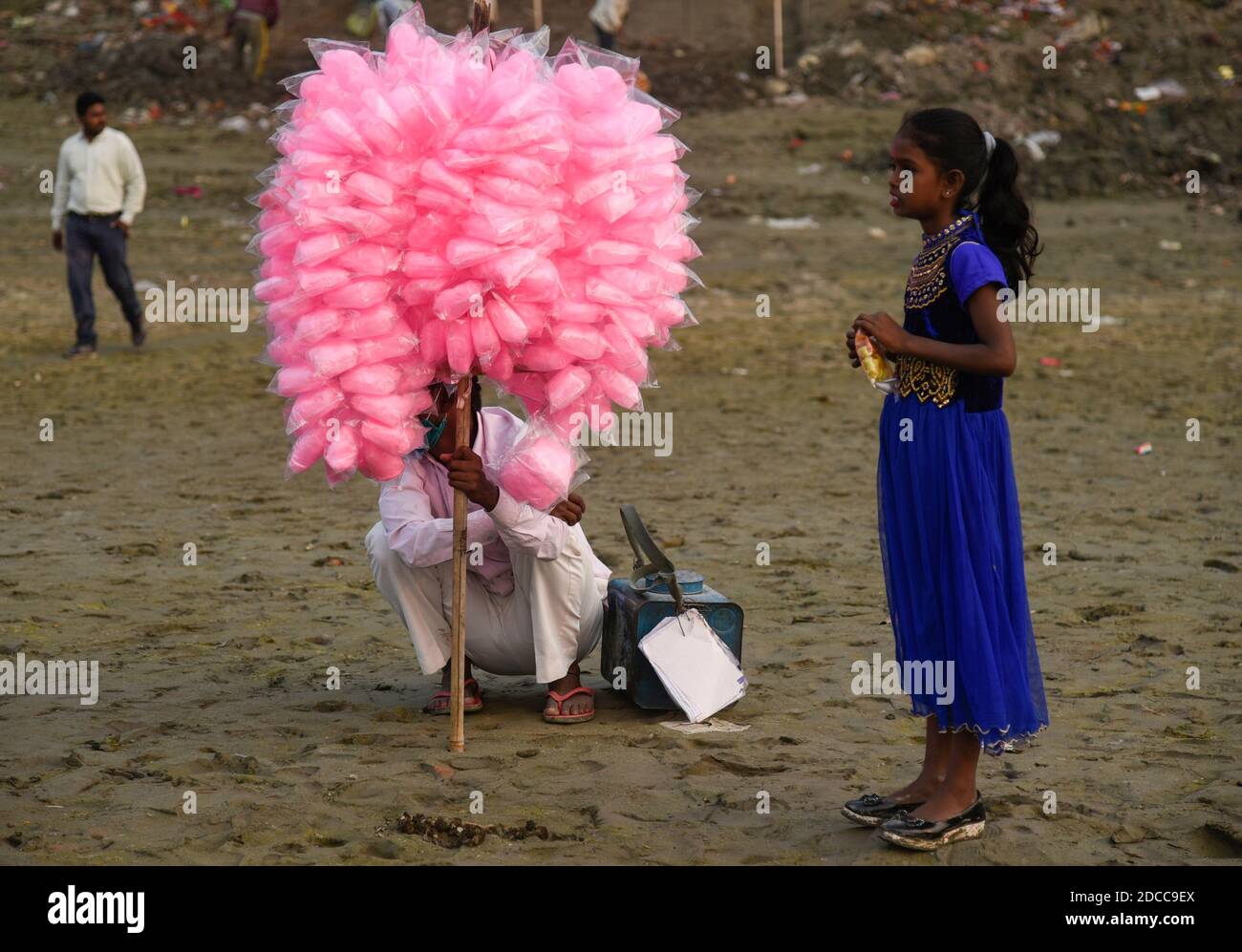 Guwahati, Assam, India. 20th Nov, 2020. Vendor selling sugar candy on ...