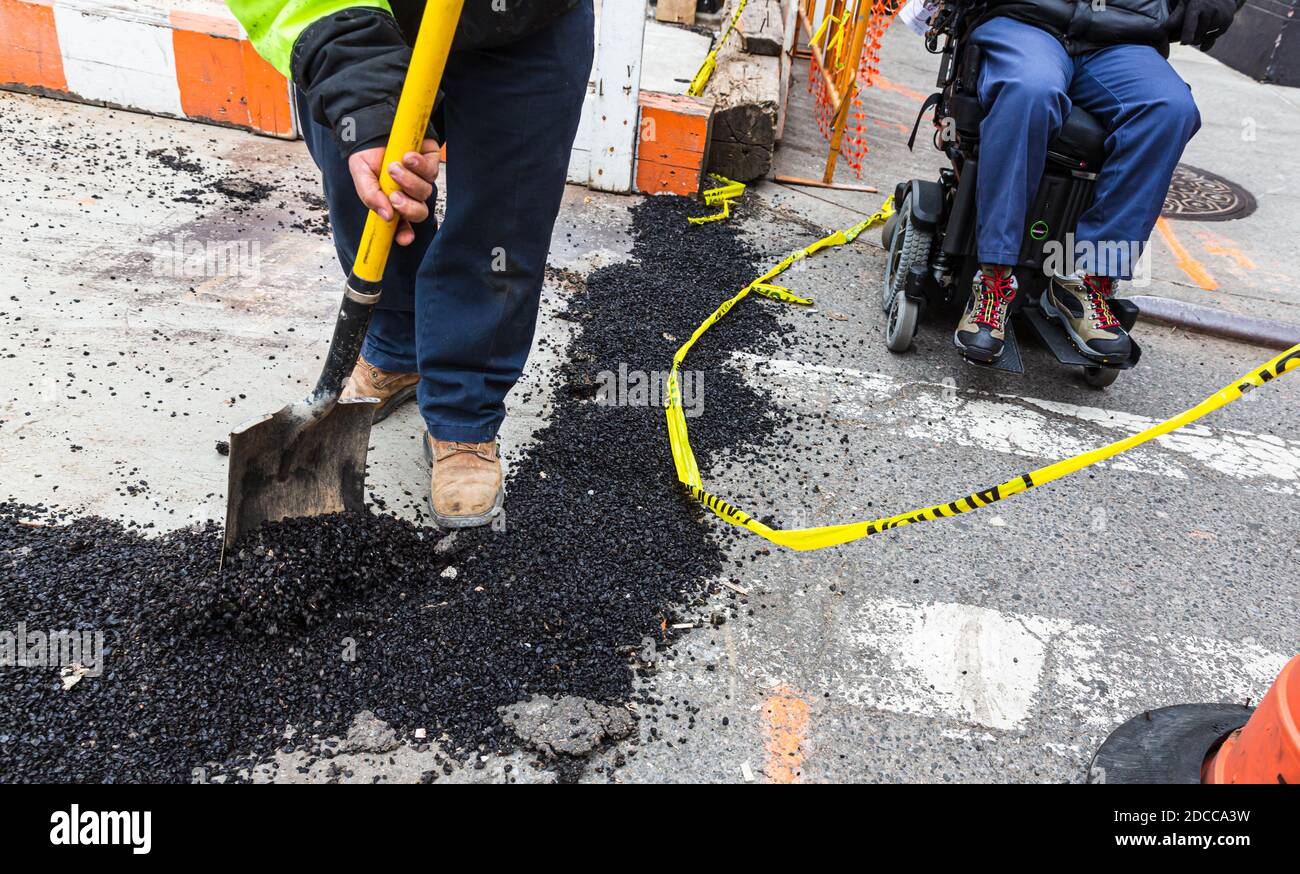 NEW YORK, USA - Apr 28, 2016: Manhattan street scene. Road works in ...