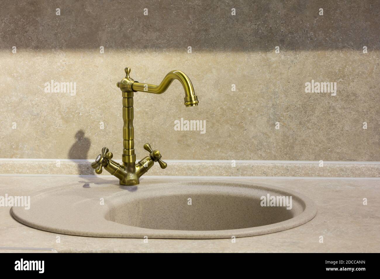 round porcelain tile kitchen sink on the kitchen countertop and retro ...