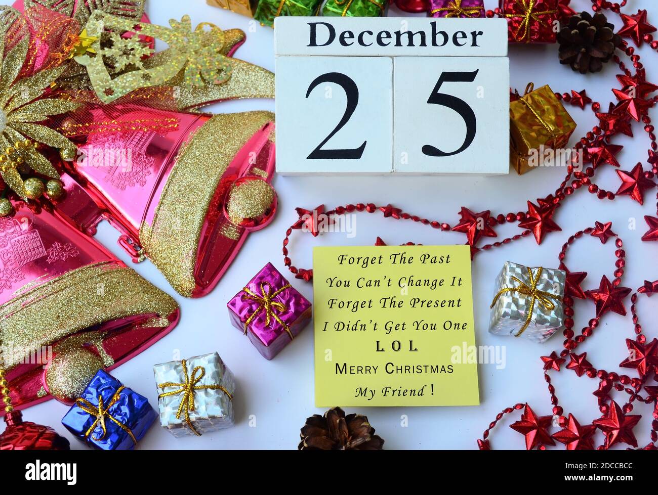 Text label and cube 25 December with Christmas ornament background ...