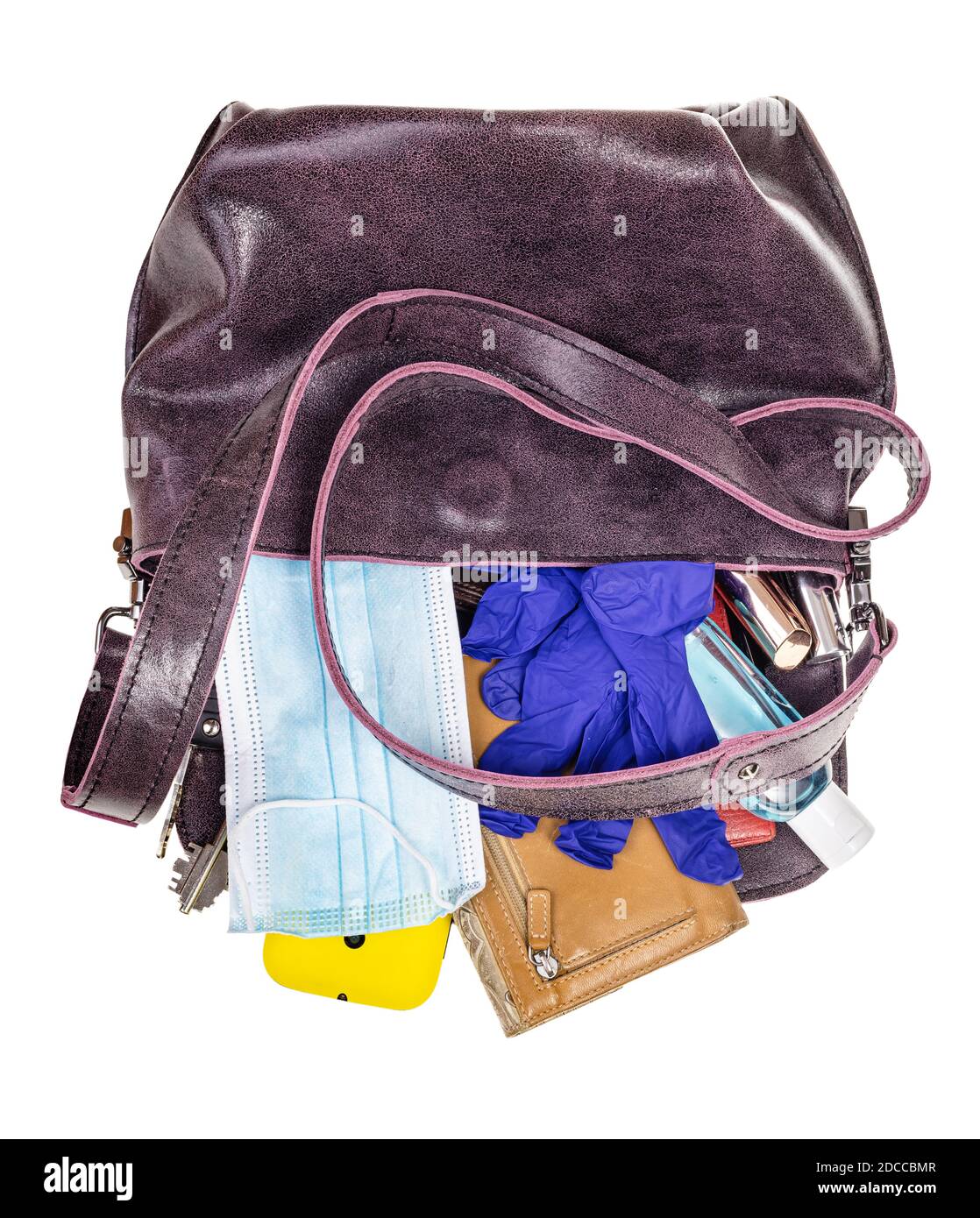 female leather bag with fell out contents and protective mask isolated ...