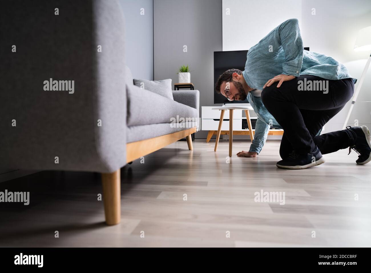 Lost Something Looking For Things. Searching Keys Stock Photo - Alamy