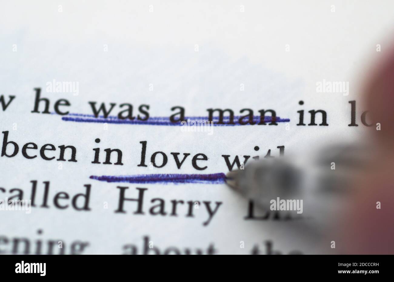 words "in love" underlined with pen in a book page Stock Photo - Alamy