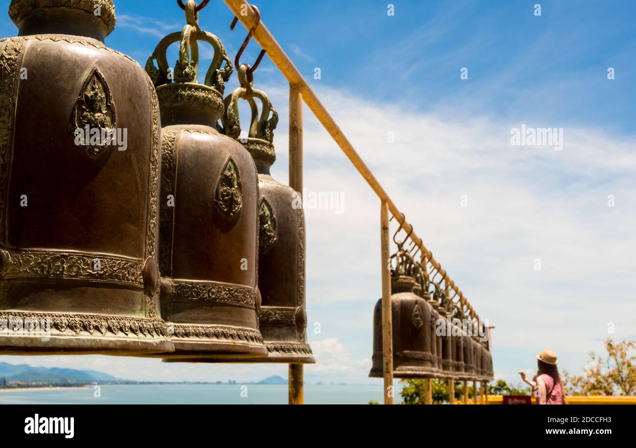 Hanging brass bells arranged on the temple terrace Stock Photo - Alamy