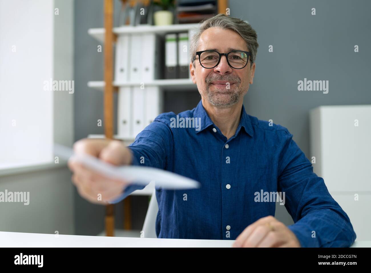 Bank cheque teller hi-res stock photography and images - Alamy