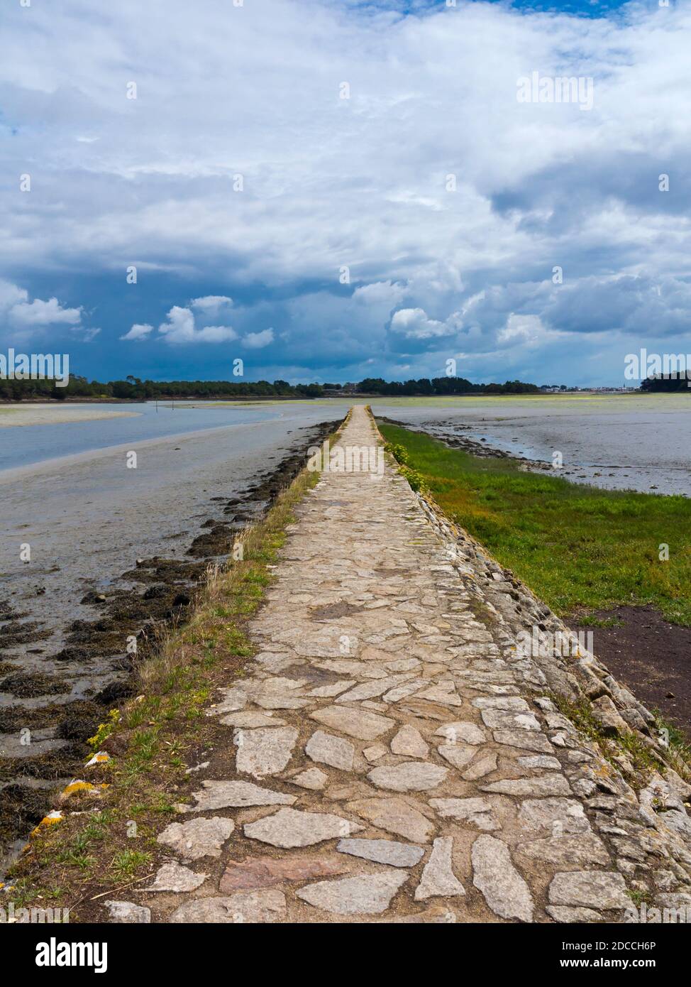 Causeway on the estuary of the Pont L'Abbe river in Finistere Brittany ...