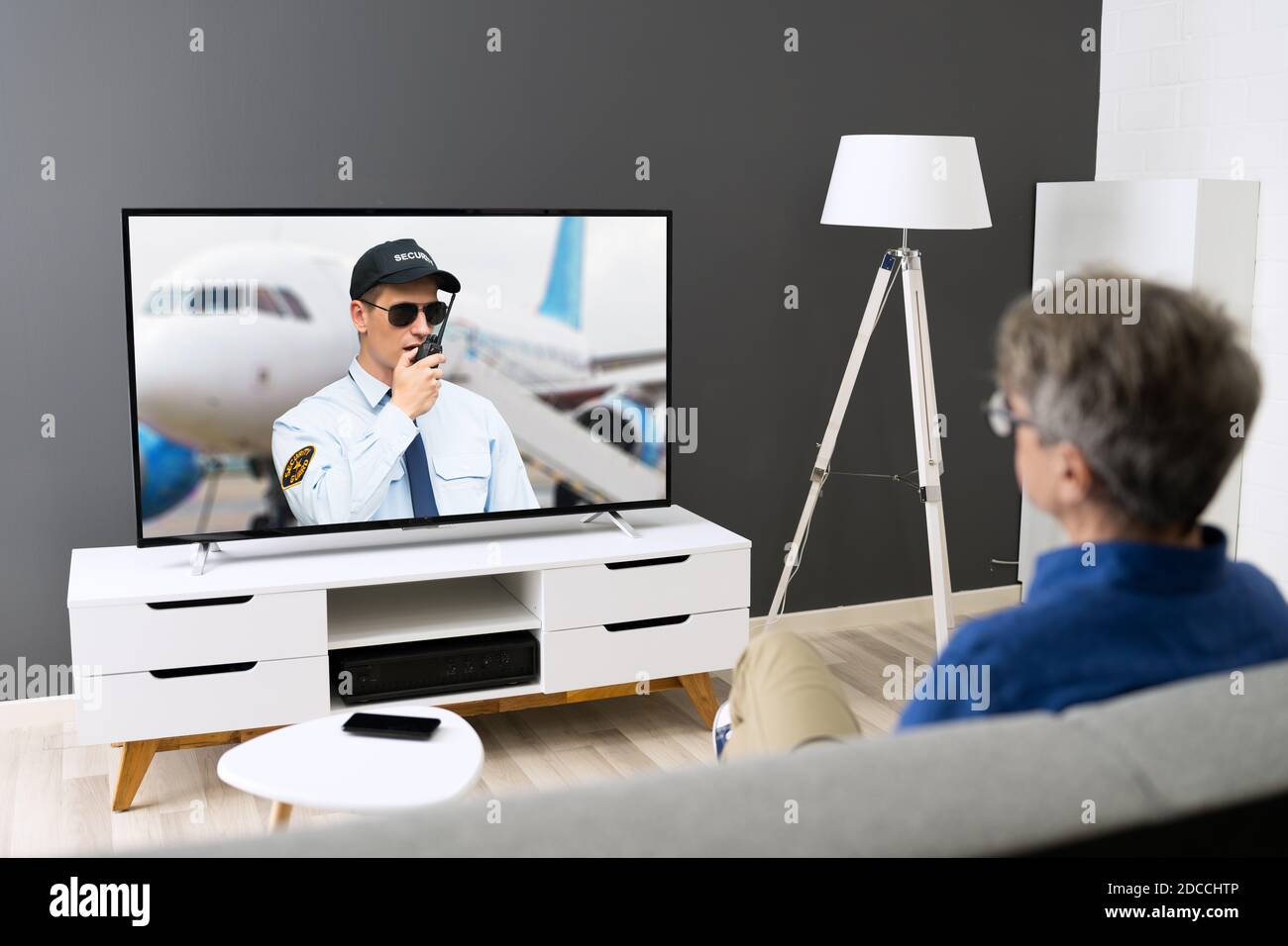 Watching TV. Streaming Television Movie At Home Stock Photo - Alamy