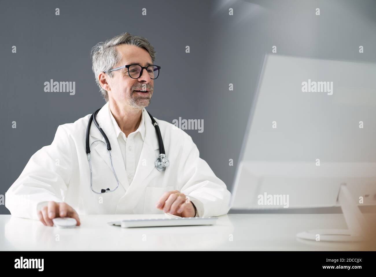Senior Older Man Doctor Computer Video Conference Stock Photo - Alamy