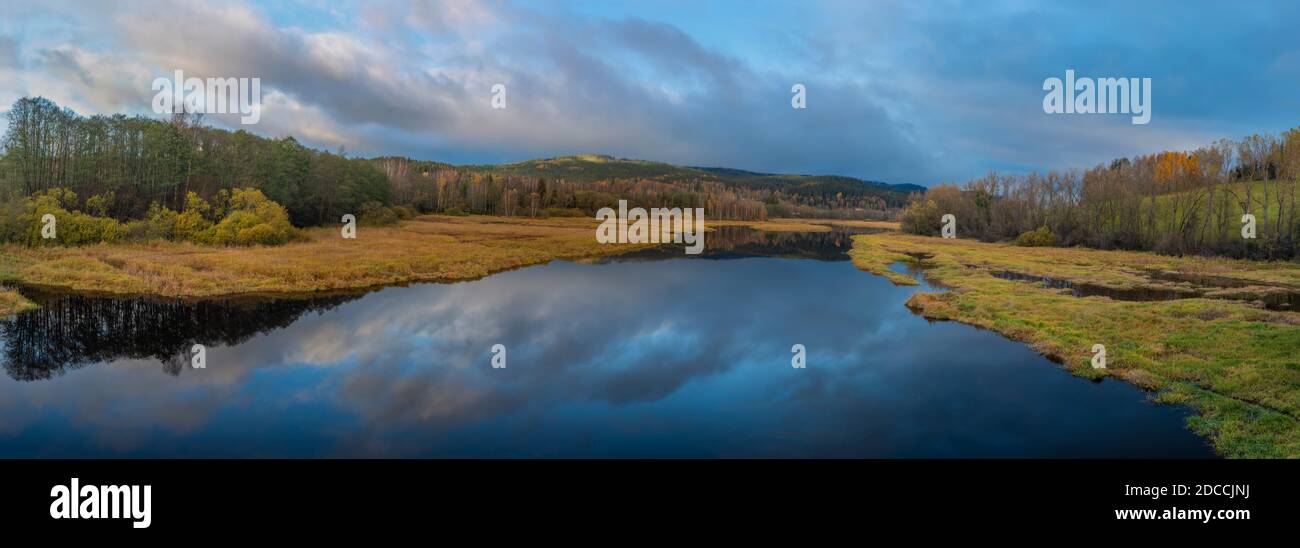 End of Lipno sea reservoir in autumn cloudy color morning near Nova Pec ...