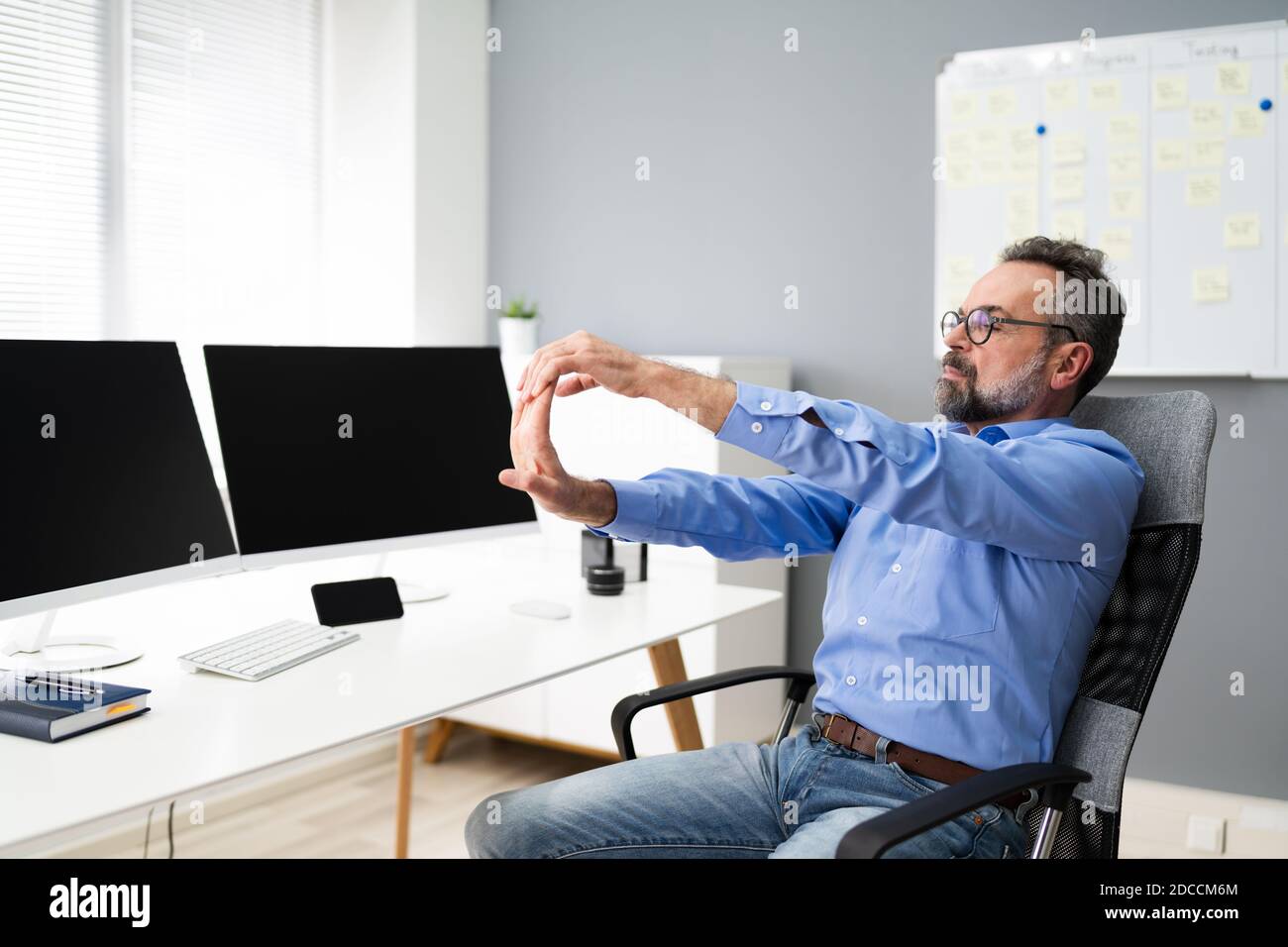 Stretching Office Workout. Desk Stretch Exercise At Workplace Stock ...