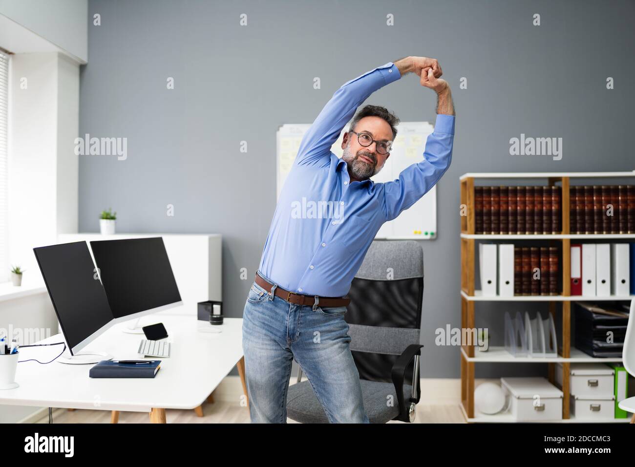 Stretching Office Workout. Desk Stretch Exercise At Workplace Stock ...