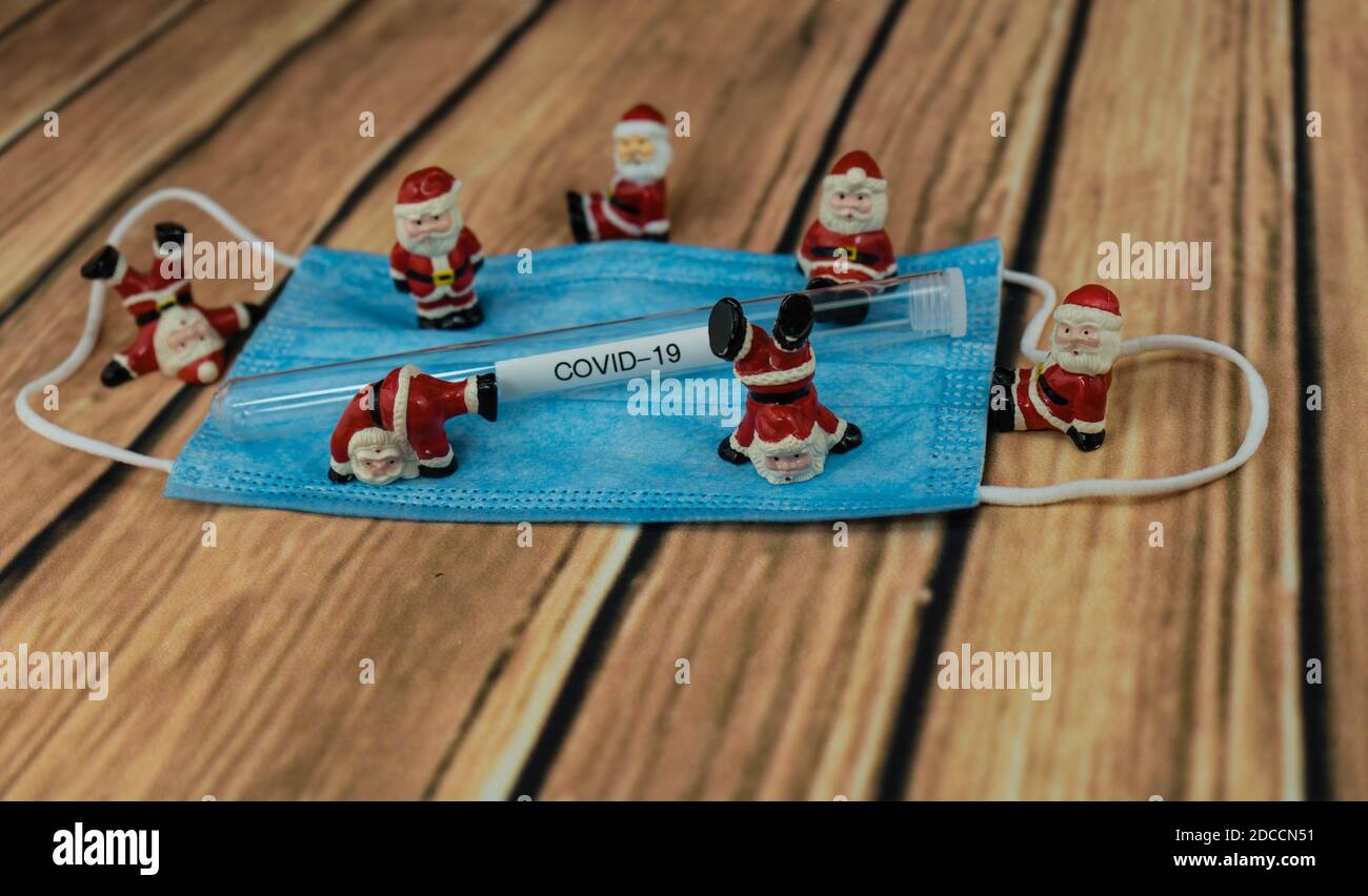 Santa claus and corona test tube Stock Photo - Alamy