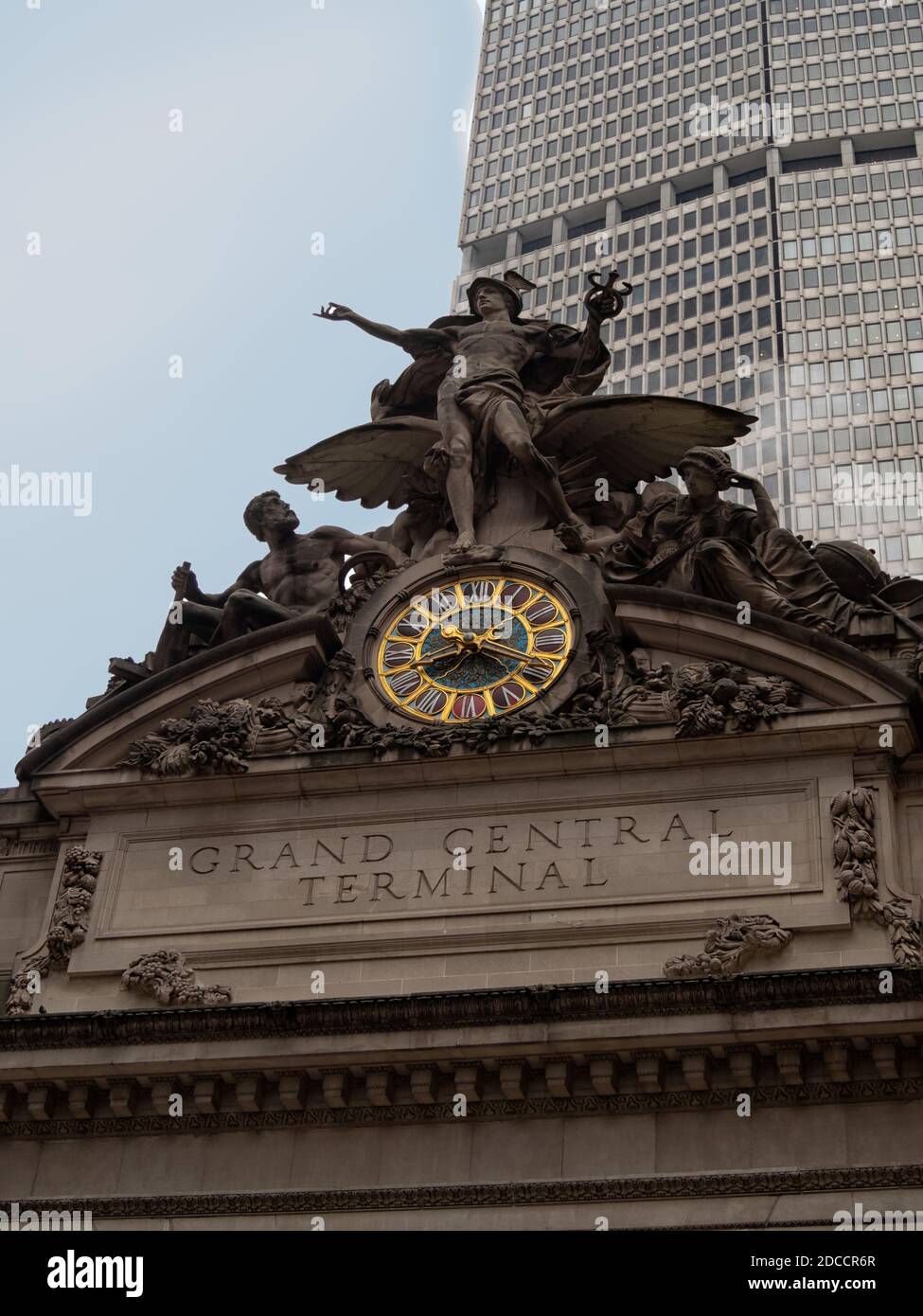 NEW YORK CITY, USA: Statue of Mercury, clock and carved sign on Grand ...