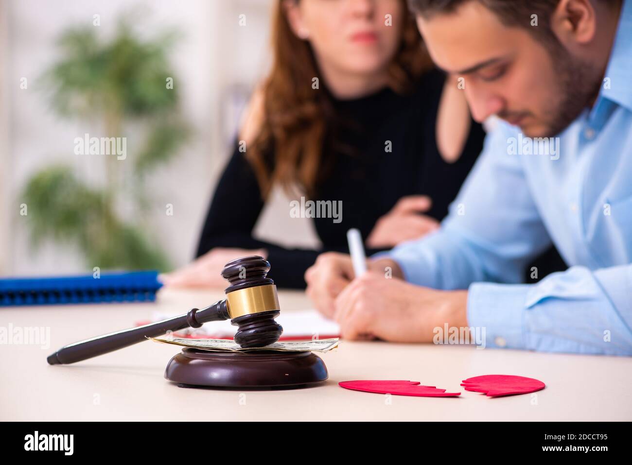 Couple divorcing in alimony concept Stock Photo - Alamy