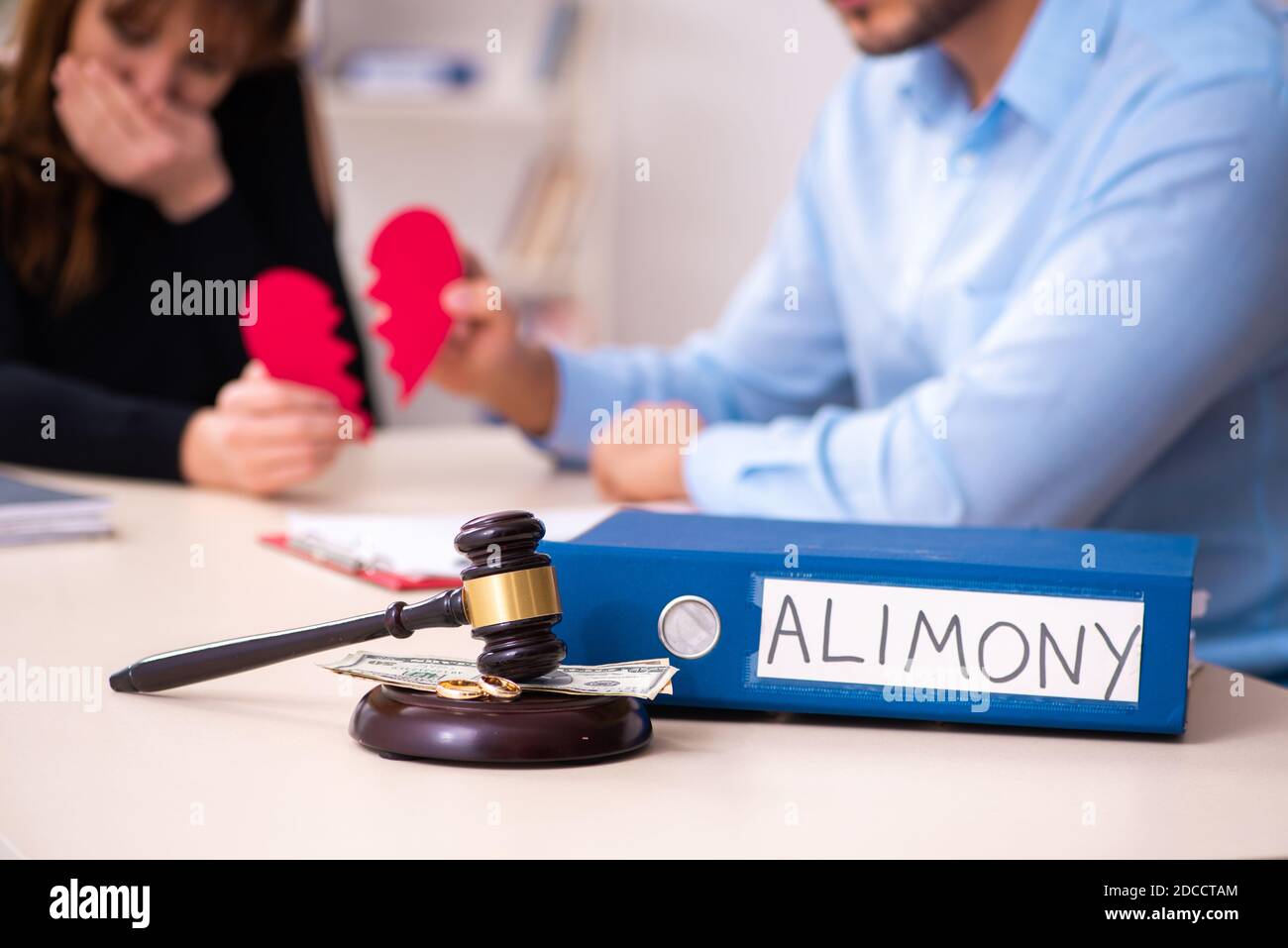 Couple divorcing in alimony concept Stock Photo - Alamy