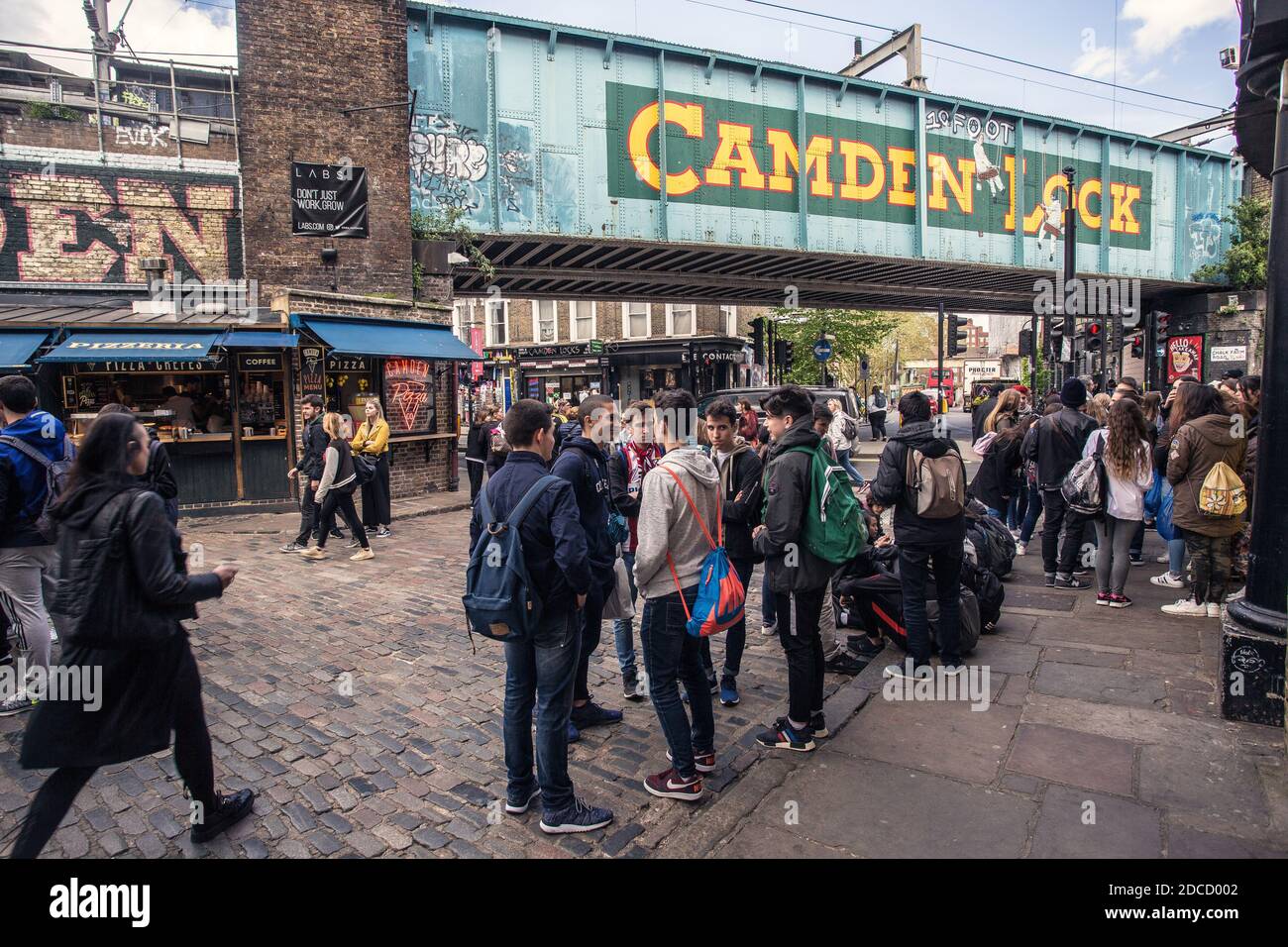 Camden Market ,Camden Lock area with a painting on the railway bridge ...
