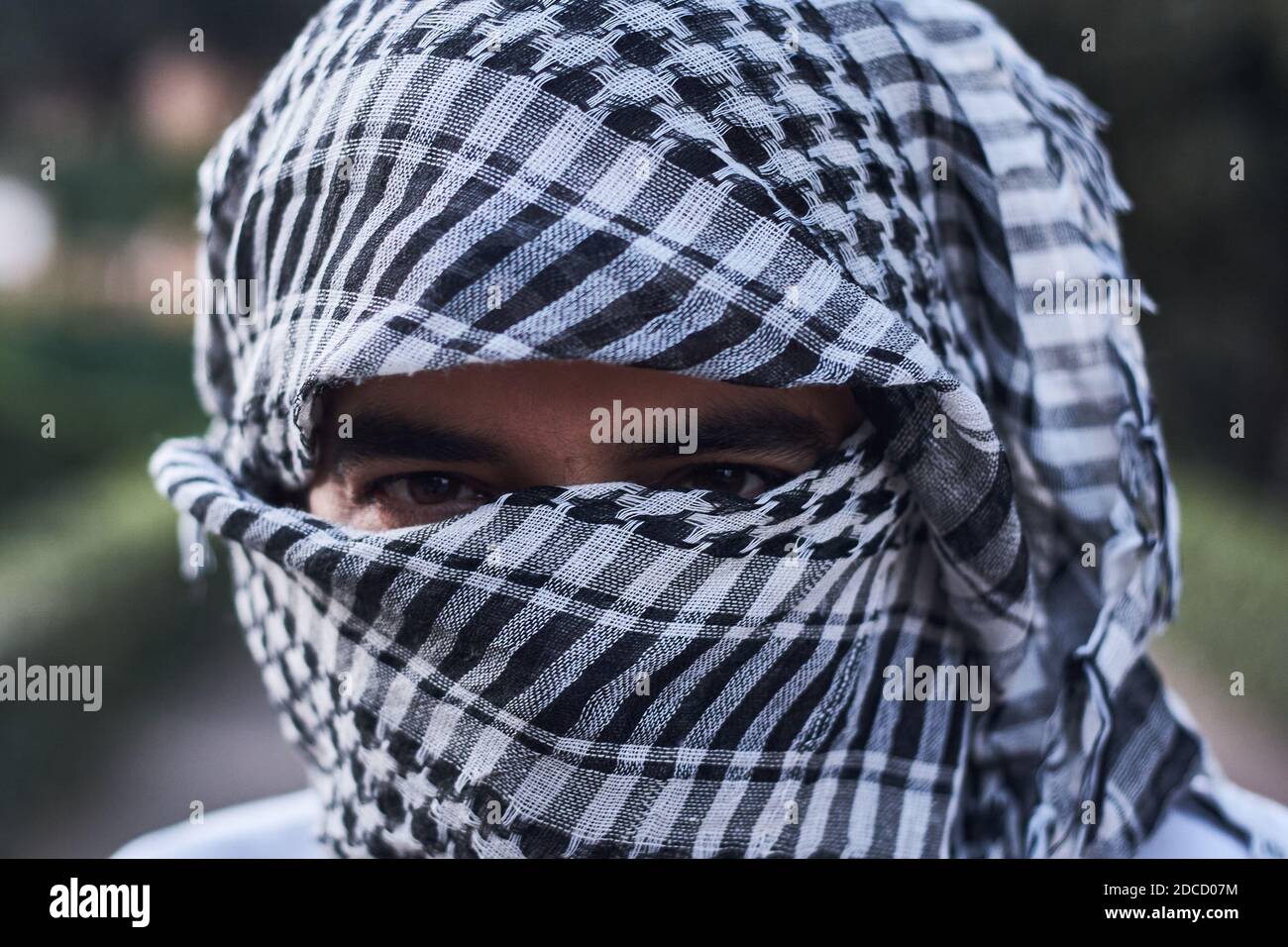 photograph of a man with a Palestinian scarf Stock Photo - Alamy