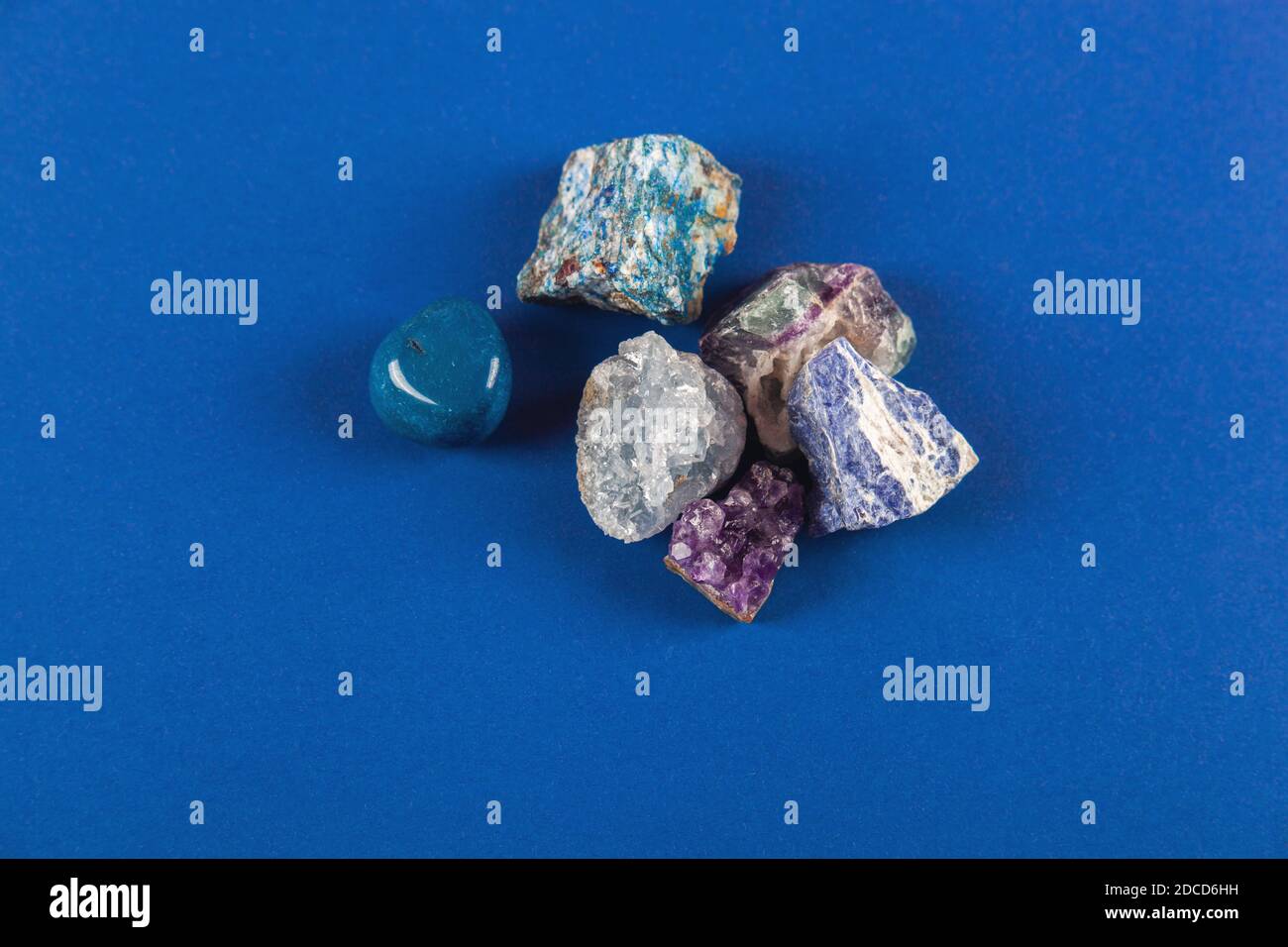 set of close up Natural minerals, precious stones on classic blue ...