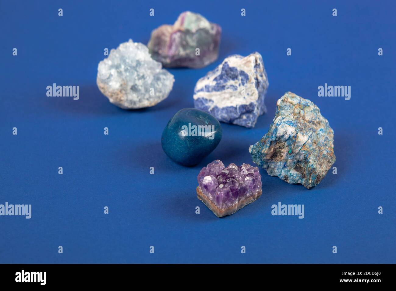 set of close up Natural minerals, precious stones on classic blue ...