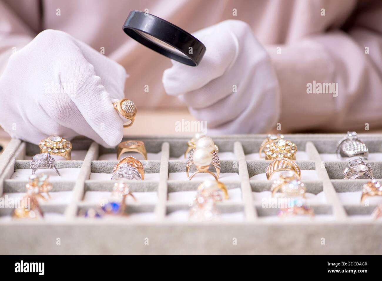 Old jeweler at the workshop Stock Photo - Alamy