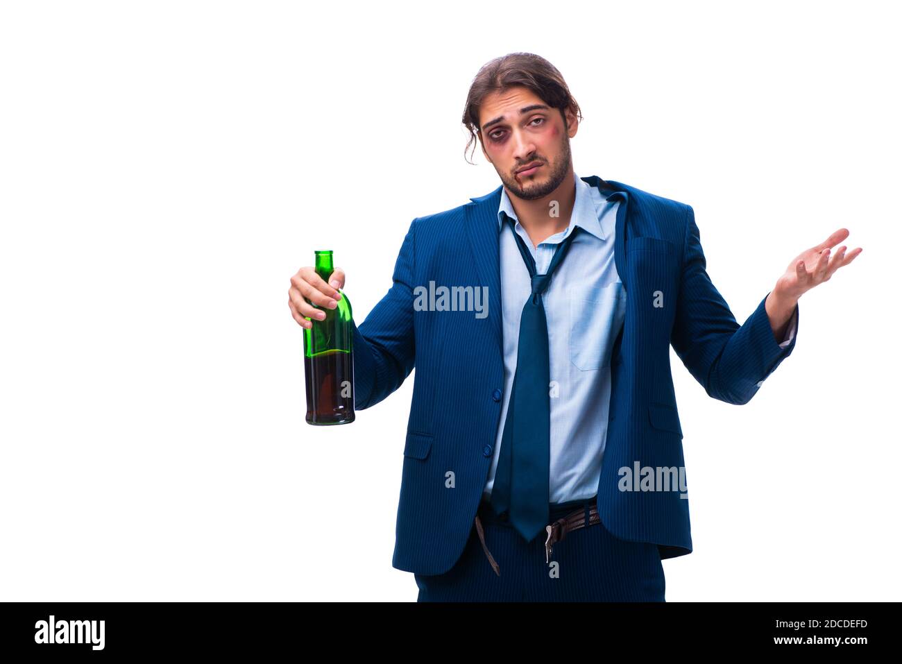 Young employee alcoholic isolated on white Stock Photo - Alamy
