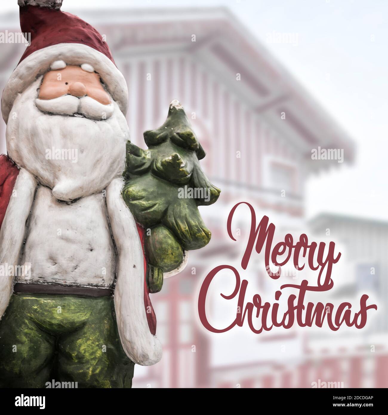 Funny Santa Claus in christmas scene with colorful houses Stock Photo ...