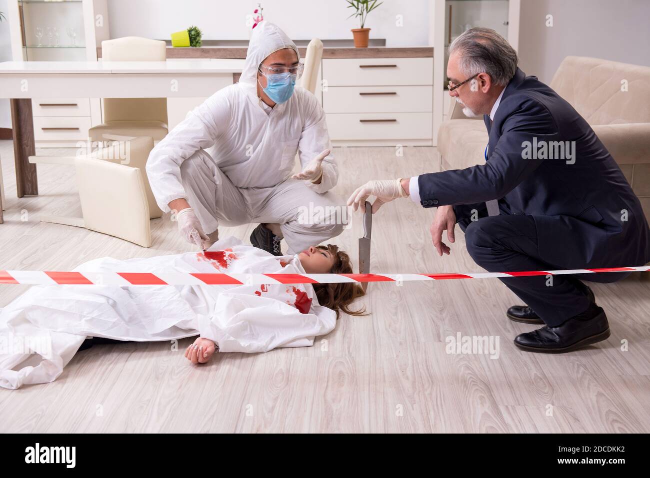 Forensic experts at the crime scene at home Stock Photo - Alamy