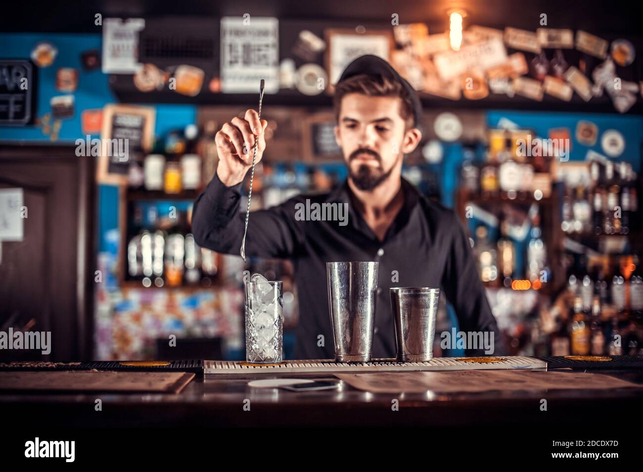 Professional Female bartender demonstrates his professional skills ...
