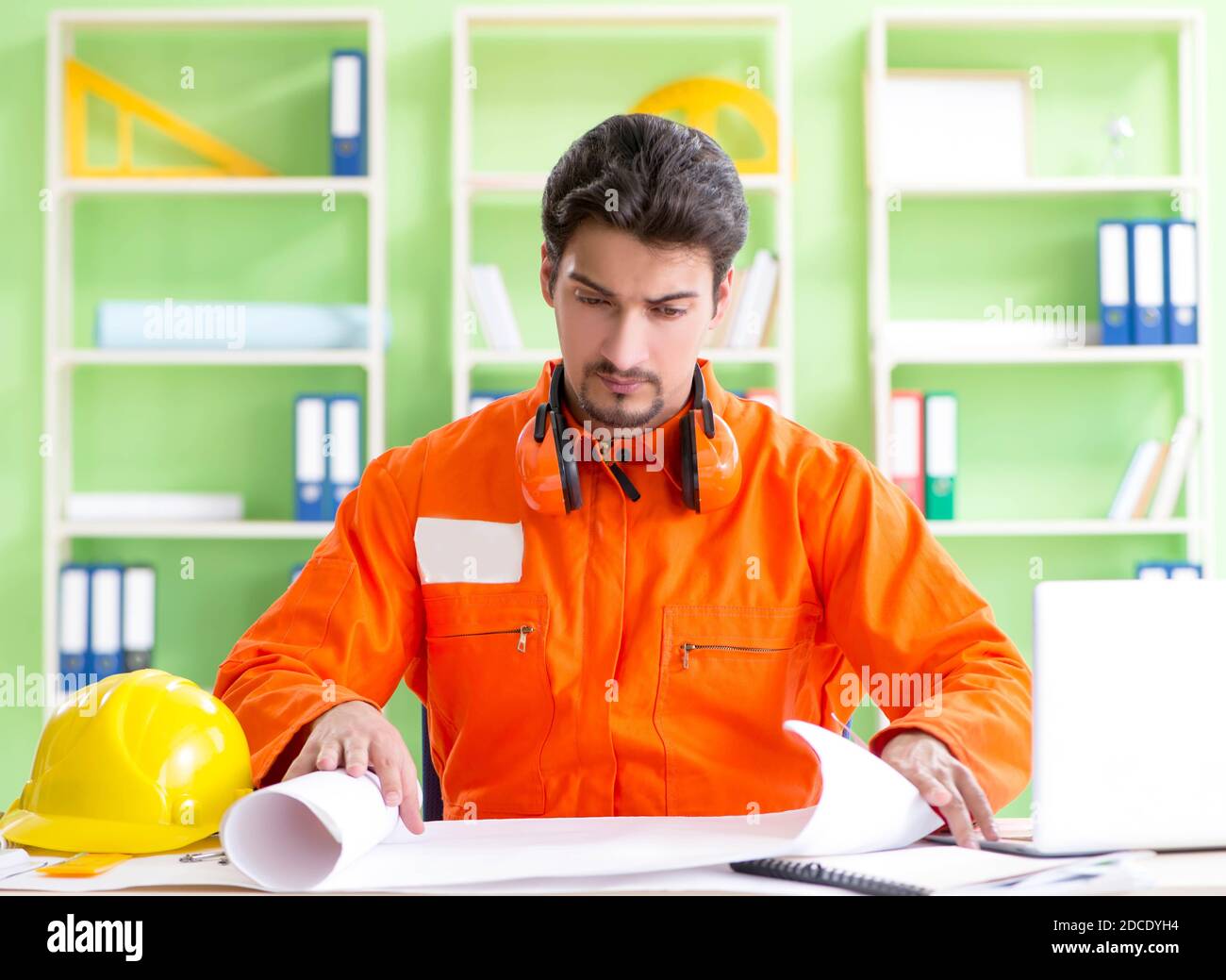 The construction supervisor planning new project in office Stock Photo ...