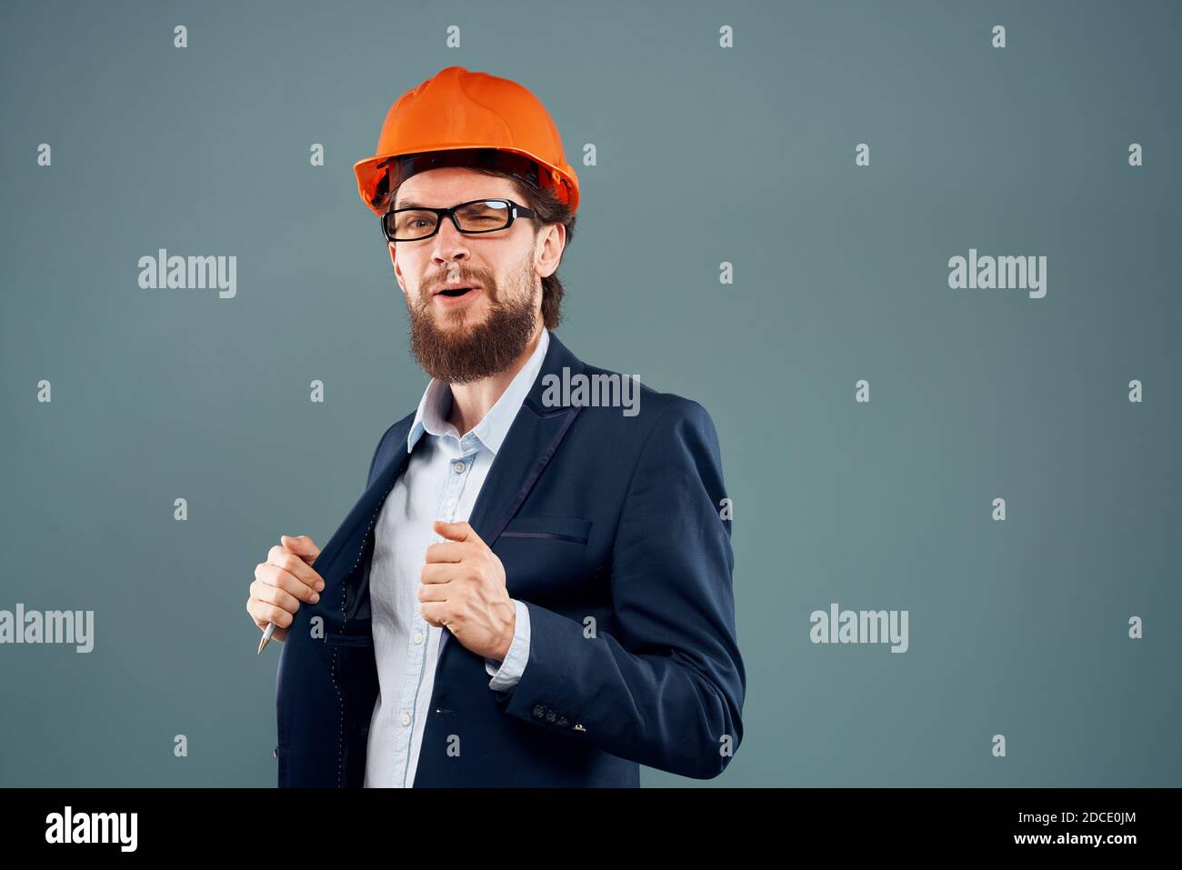man in orange suit hard hat engineer construction work lifestyle ...