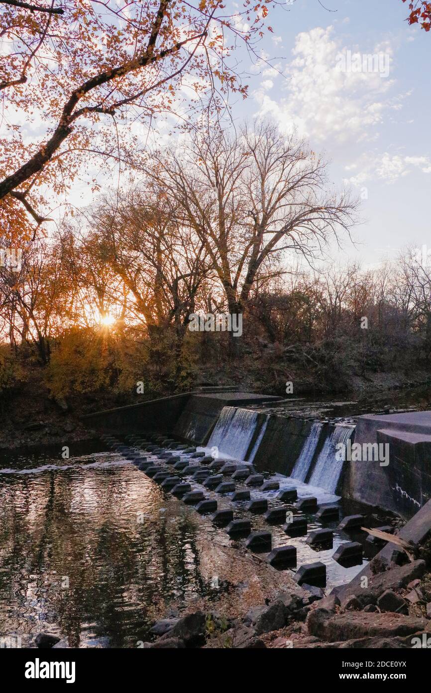 Side view of a dam as the sun is setting Stock Photo - Alamy